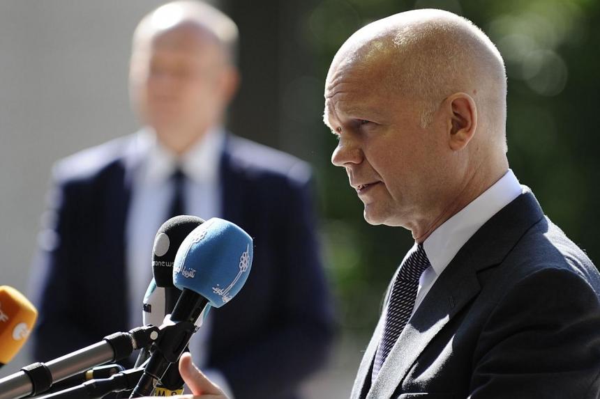 Britain's William Hague arrives in Baghdad, urging unity in face of ...