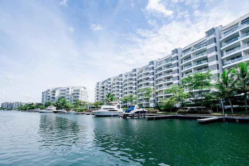 Lights off on Singapore's Sentosa Cove as luxury house prices plunge ...