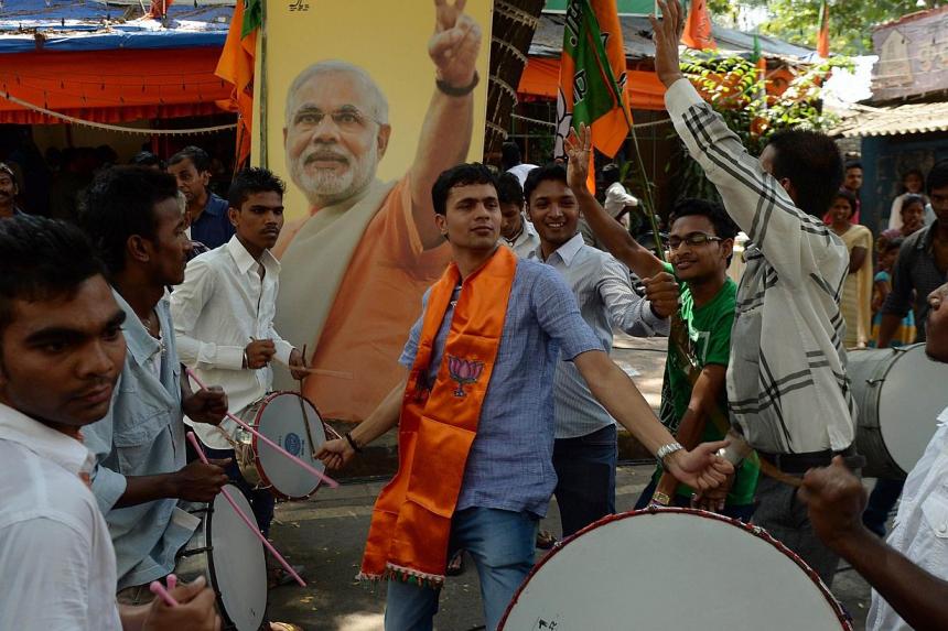 Modi's party wins big in key states | The Straits Times