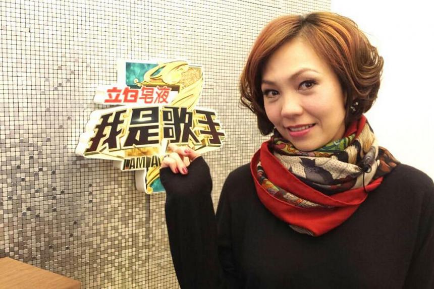 Kit Chan out of I Am A Singer | The Straits Times