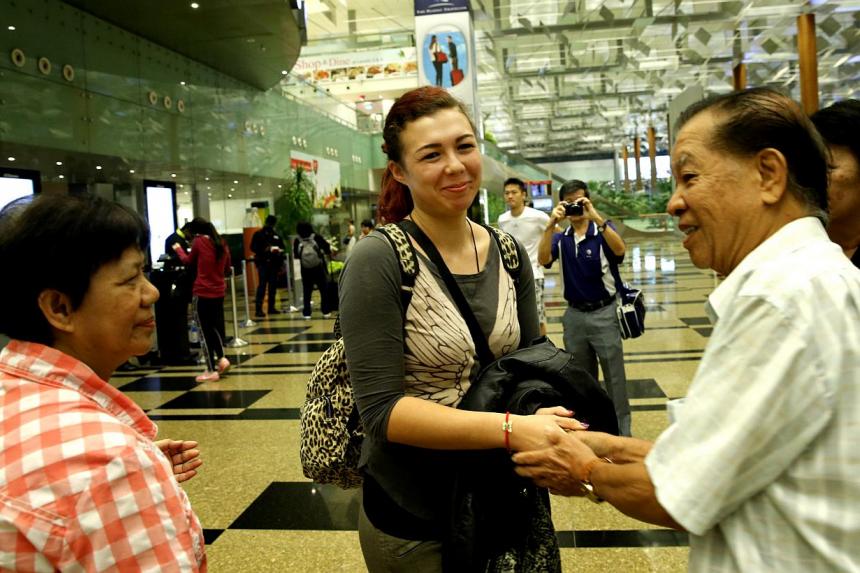Polish orphan Colleen Turzynski leaves Singapore - with more luggage ...