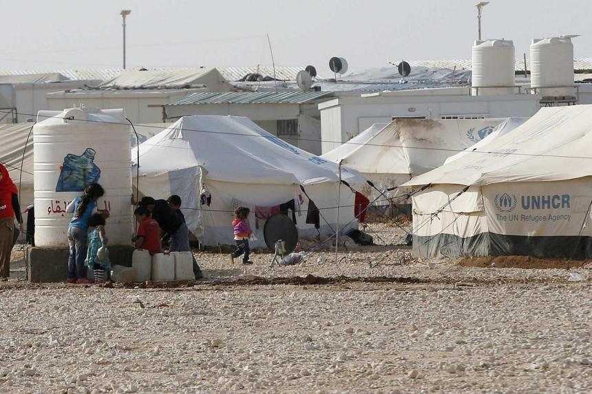 UN 'alarmed' by photos of ISIS labels on its Syria food aid | The ...