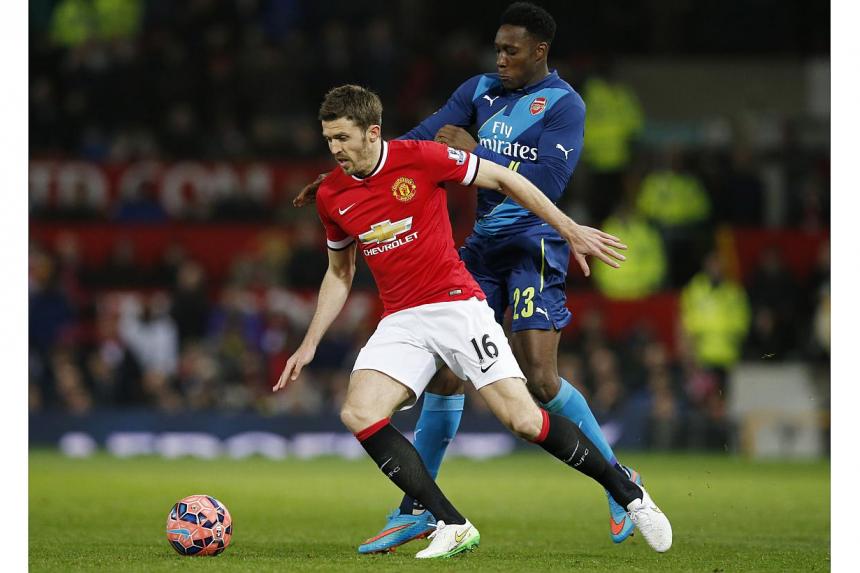 Football: Carrick signs one-year extension with United | The Straits Times