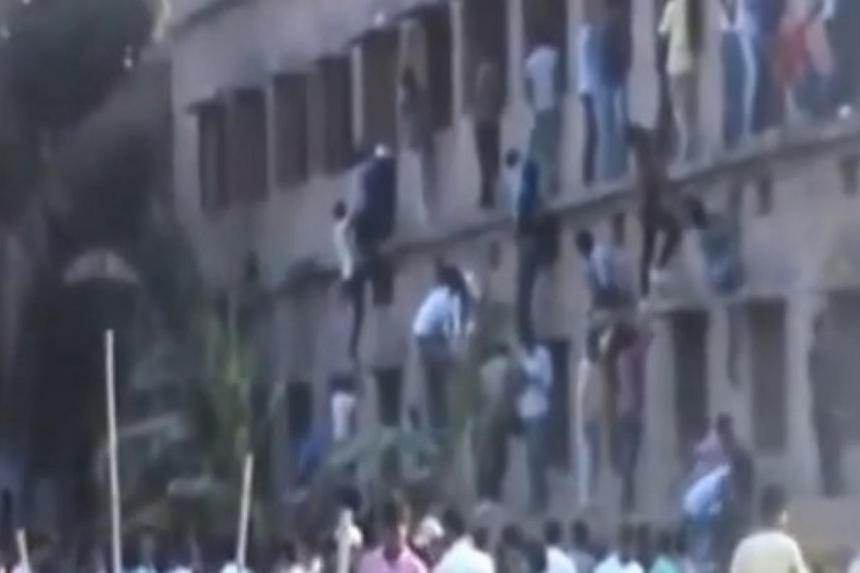 Images show blatant cheating in examinations in India's Bihar state ...