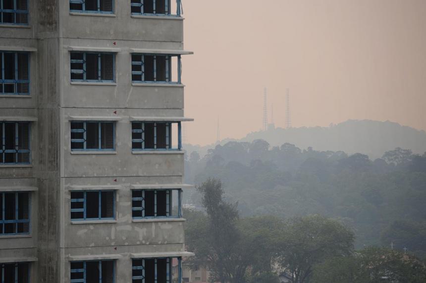 Slight haze lingers in Singapore on Sunday | The Straits Times