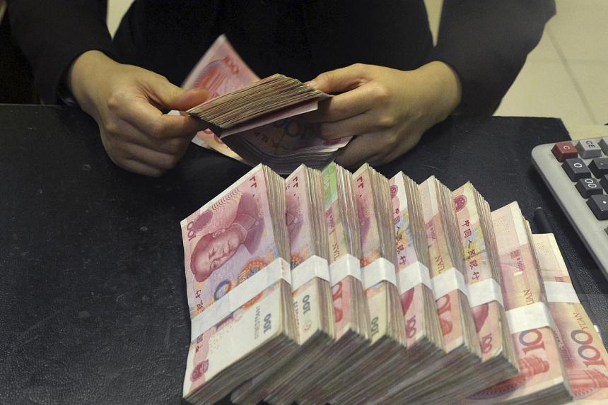 China to promote yuan by relaxing investment scheme rules: sources ...
