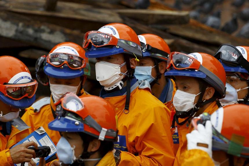 Government says no more foreign rescue teams needed, but many still ...