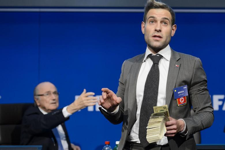 Football Funnies: Prankster interrupts Fifa press conference to throw ...