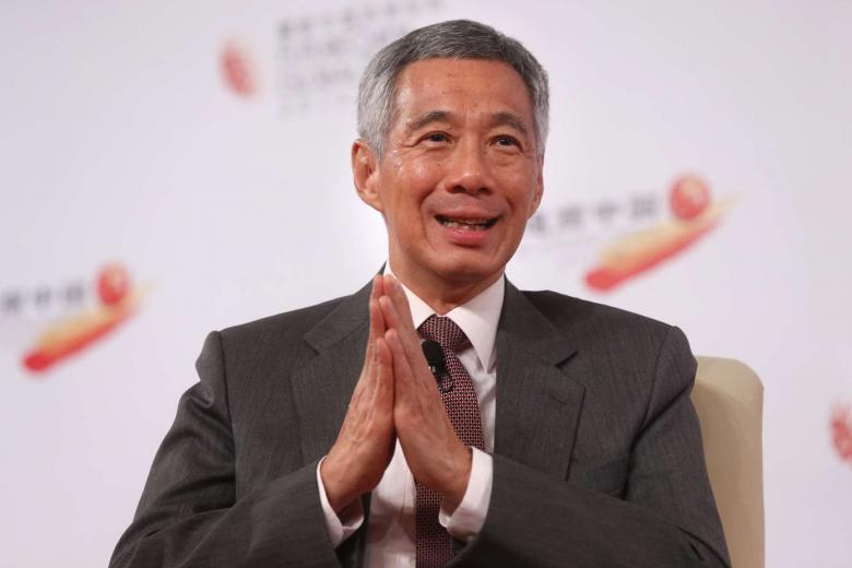 PM Lee sees Singapore moving forward confidently beyond 50 | The ...
