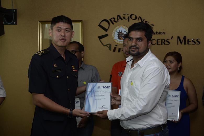 16 people get SCDF awards for lifting trailer truck to free man pinned ...