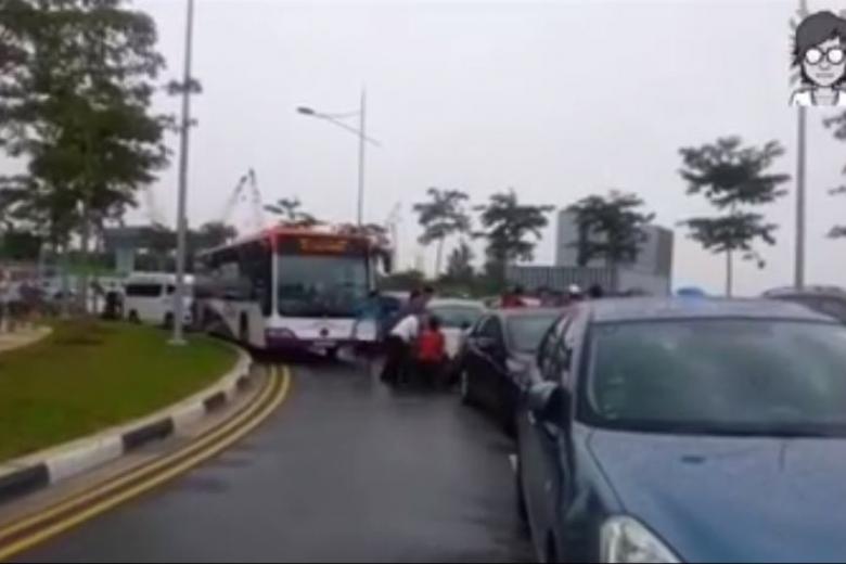 Passers-by work together to move parked car so bus can pass | The ...