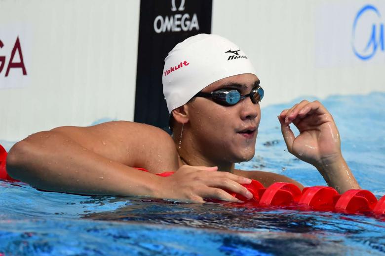Swimming: Schooling breaks national 100m fly record en route to World ...