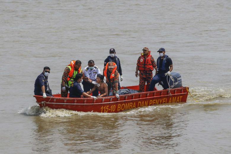 Toll rises to 50 in Malaysian migrant boat accident, survivor found ...