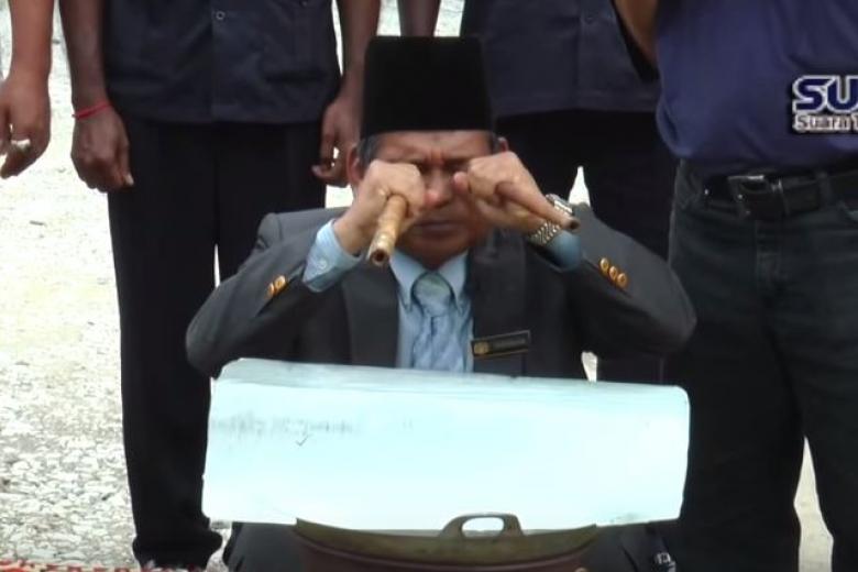 Malaysian bomoh seeks divine guidance to tackle country's haze | The ...