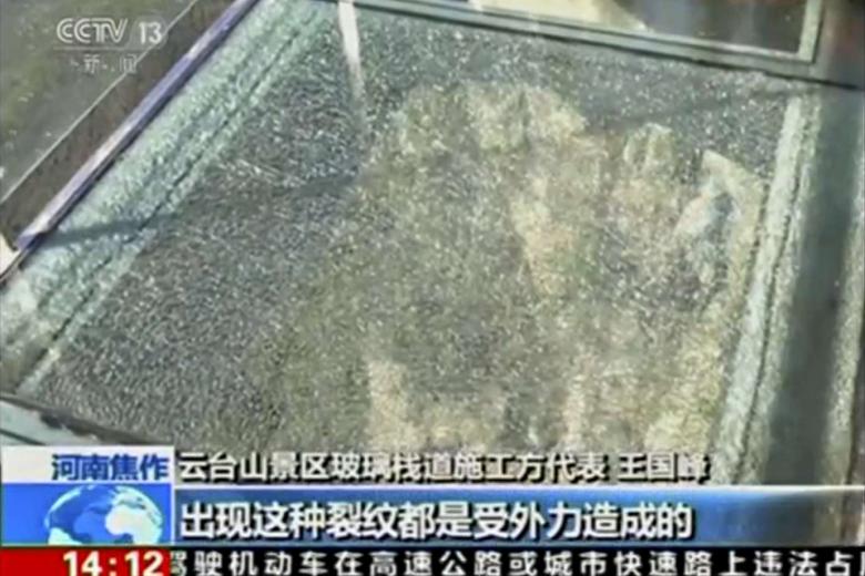 China's new glass bridges test courage of tourists, who flock there ...