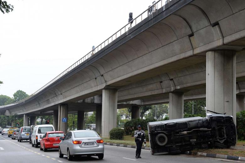 Lorry driver injured after his vehicle hits pillar supporting MRT track ...