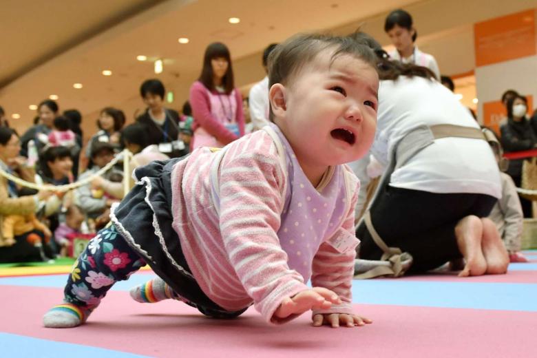 Babies crawl, and bawl, to finish line in world's largest crawling ...