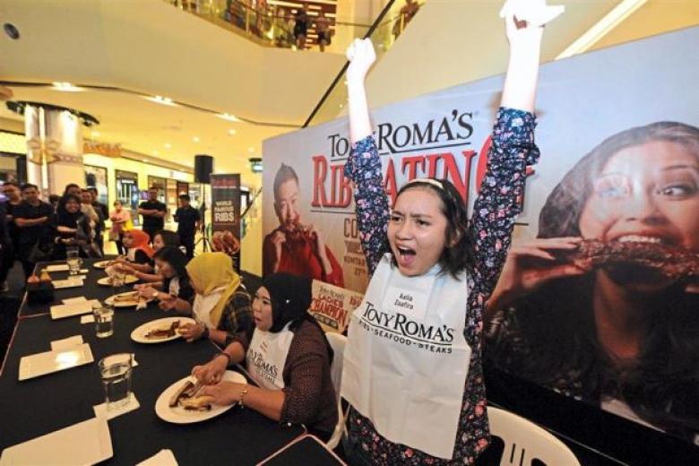 Pint-sized girl, 12, wins ribs-eating contest in Johor Baru | The ...