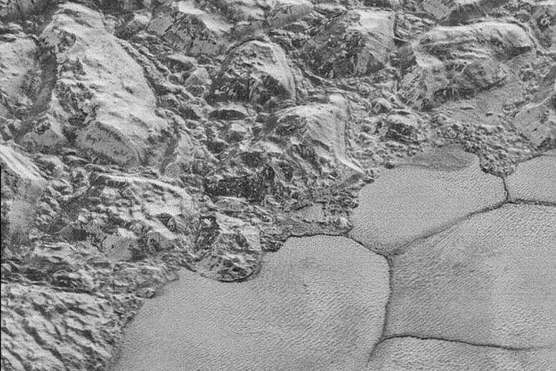 Nasa releases 'best close-ups' of Pluto | The Straits Times