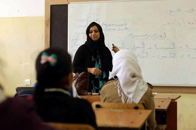 Children return to school in Libya's war-torn Benghazi | The Straits Times