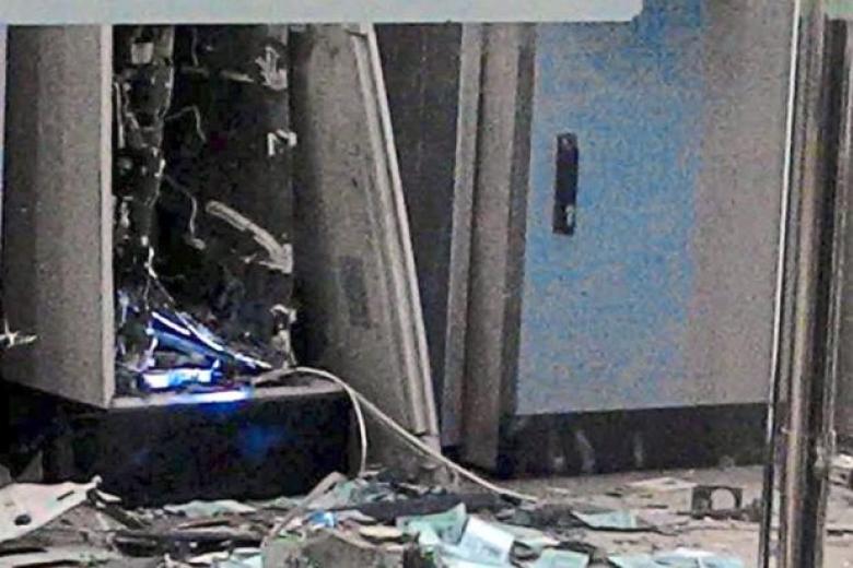 Masked men blast ATM with homemade pipe bomb in Malaysia, escape with ...