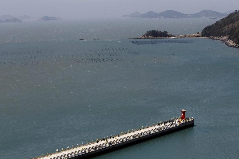 Two years after tragedy, cranes brace to raise Sewol ferry in South ...