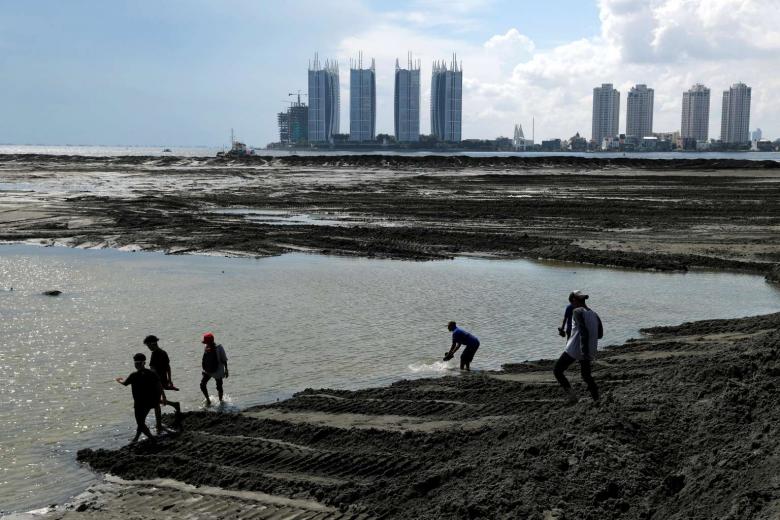 Parts of Jakarta will sink below sea level without scandal-mired ...
