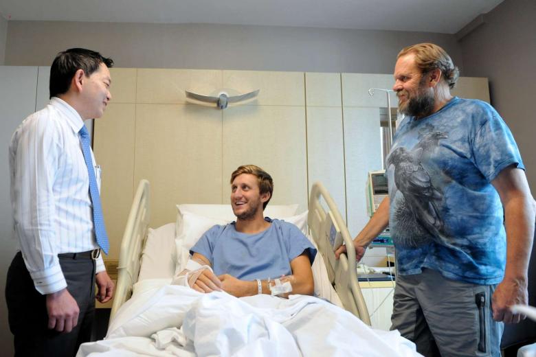 American surfer mauled by shark in Bali recuperating from surgery in ...