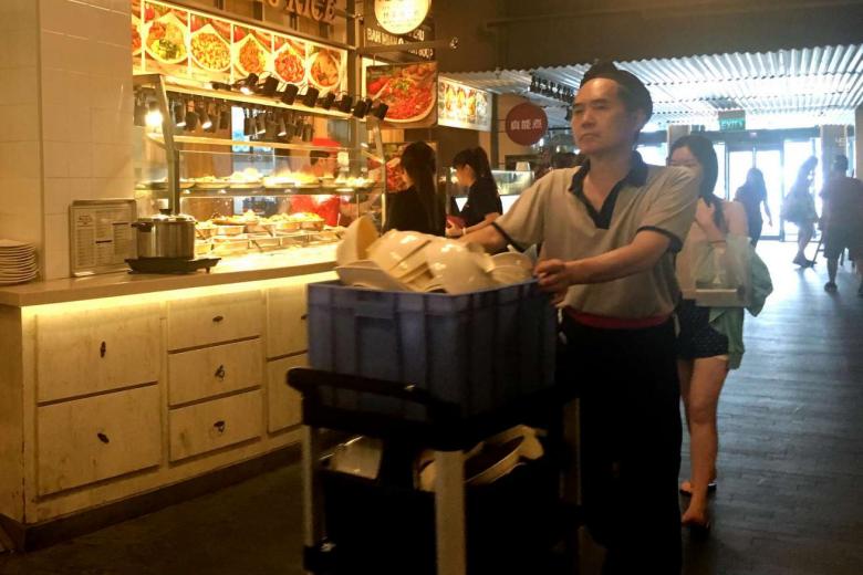 Minister Tan Chuan-Jin visits Jem foodcourt cleaner; urges employers to ...