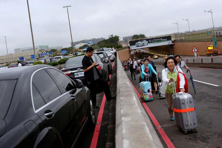 More than 2,000 people evacuated as heavy rain hits southern Taiwan ...
