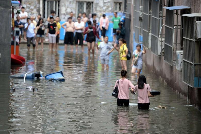 Heavy rain in China kills at least 87, millions evacuated | The Straits ...