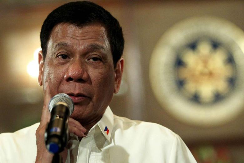 Philippines' Duterte vows to keep 'shoot-to-kill' order | The Straits Times