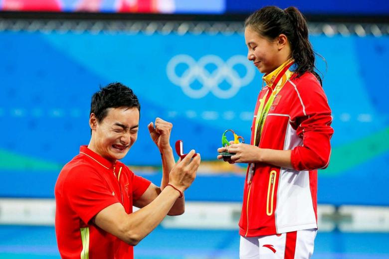 Olympics: Chinese diver wins silver medal - and diamond ring - in ...