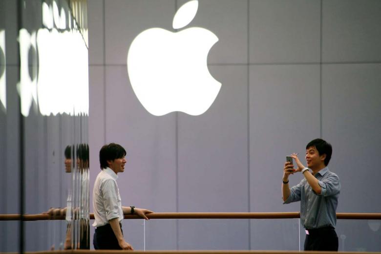 Apple to increase investment in increasingly tough China | The Straits ...
