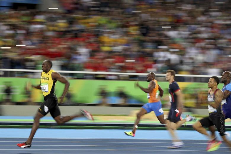 Olympics: No 200m world record for Usain Bolt but he still wins gold in ...
