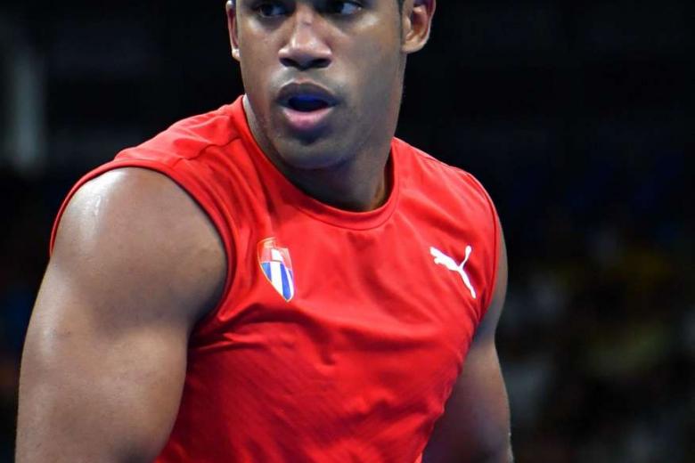 Olympics: Lopez wins middleweight boxing title for third Cuban gold ...