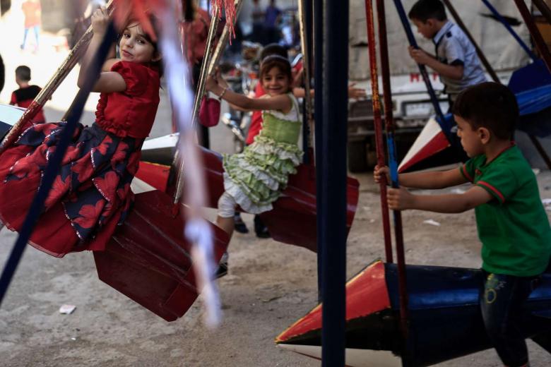 Besieged Syrian kids play with swings made of rockets | The Straits Times