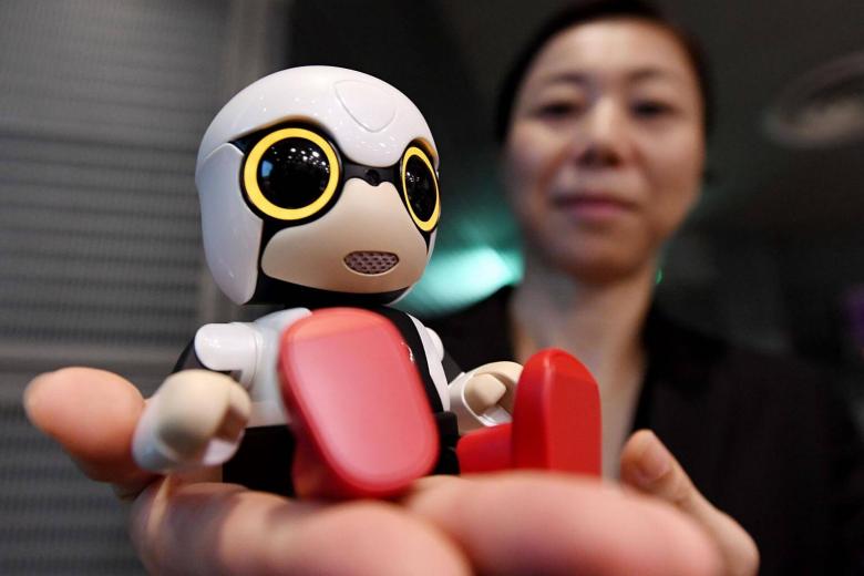 Toyota unveils Kirobo Mini, a robot baby to tug at maternal instincts ...