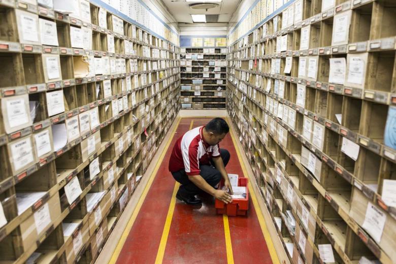 Malaysia's 200-year old snail mail operator taps Alibaba giant for ...