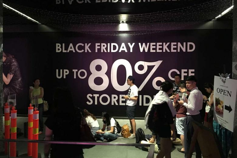 In Pictures: Shoppers raid stores for Black Friday sales | The Straits ...