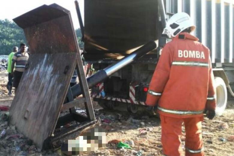 Malaysia rubbish collector crushed to death in freak accident | The ...
