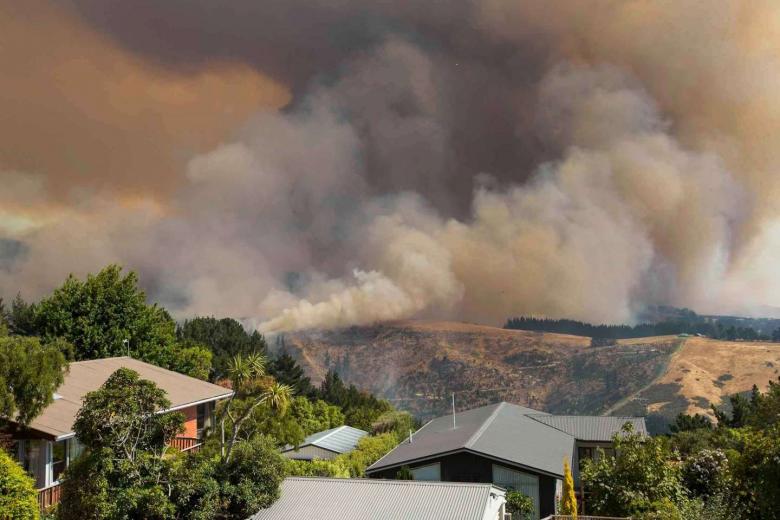 Residents return home as New Zealand wildfire threat eases | The ...