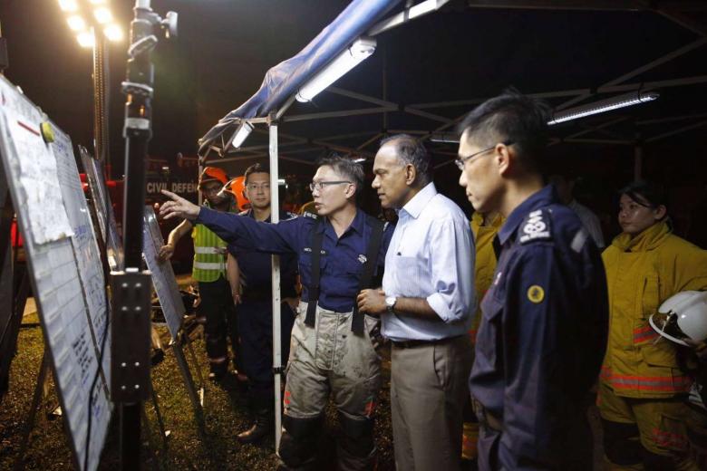 Shanmugam visits firefighters at Tuas fire site | The Straits Times