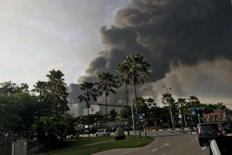 Tuas fire put out after 4 hours, no casualties reported, cause of fire ...