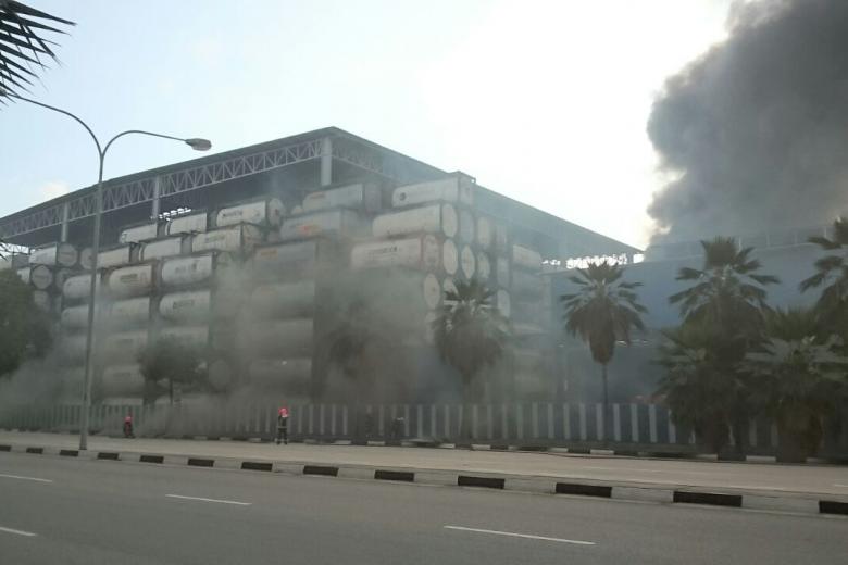 Tuas fire put out after 4 hours, no casualties reported, cause of fire ...