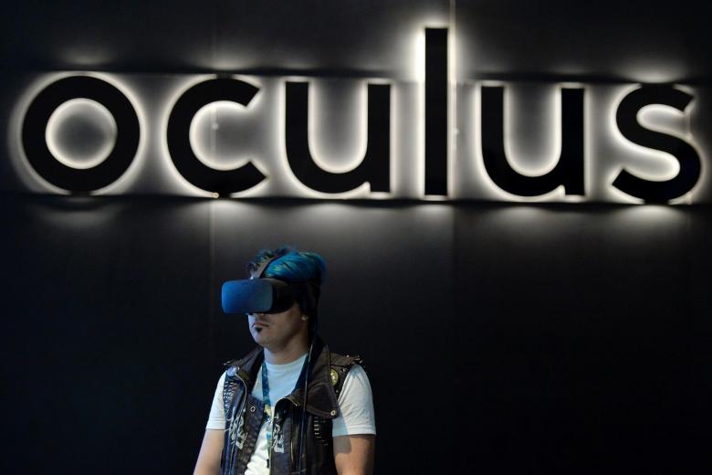 Oculus looks to spur VR spread with Rift price cut | The Straits Times