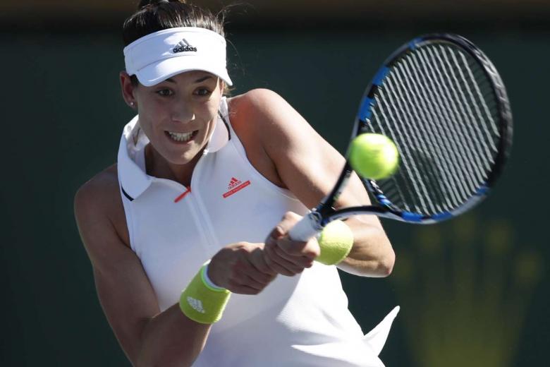 Tennis: Muguruza survives scare to beat teenager Day | The Straits Times