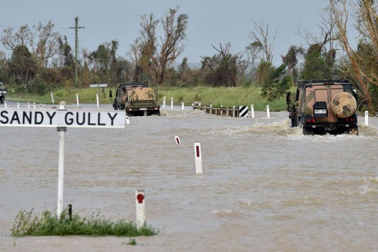 Torrential rain, floods hamper Australia cyclone relief | The Straits Times