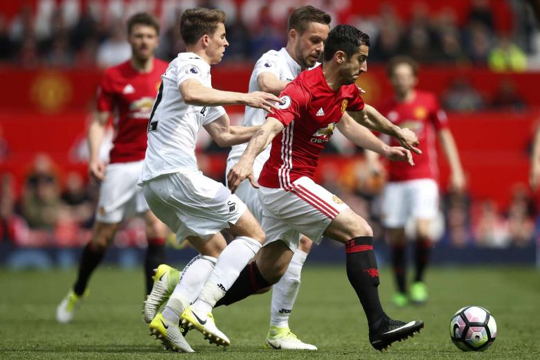 Football: Decimated Manchester United held by lowly Swansea as injury ...