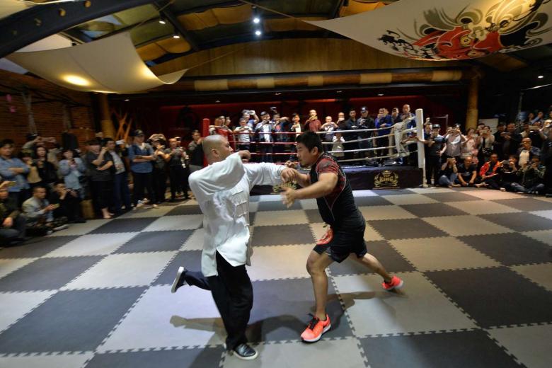 Gone in 10 seconds: Chinese MMA fighter delivers lightning-fast ...